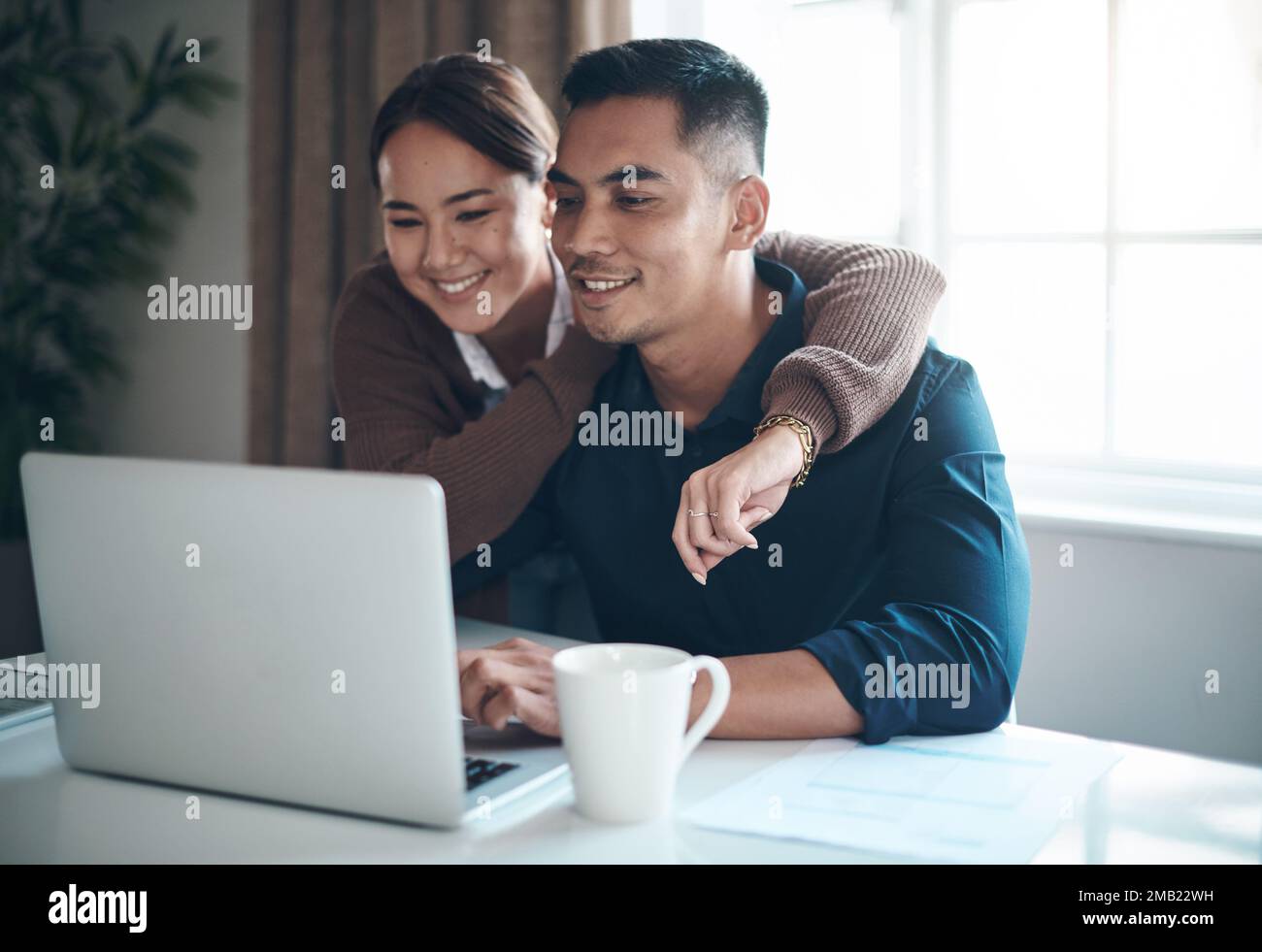 Getting their lives together with proper planning. a young couple using ...