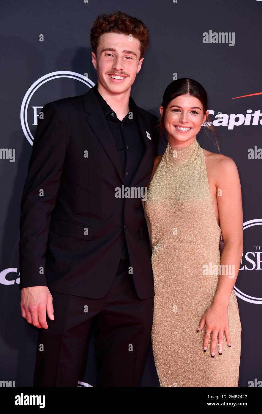 Doug Edert, left, and Olyvia Smith arrive at the ESPY Awards on ...
