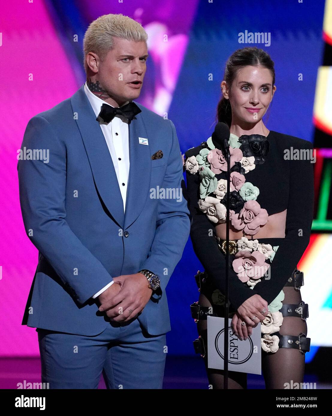 WWE wrestler Cody Rhodes, left, and Alison Brie present the award for ...