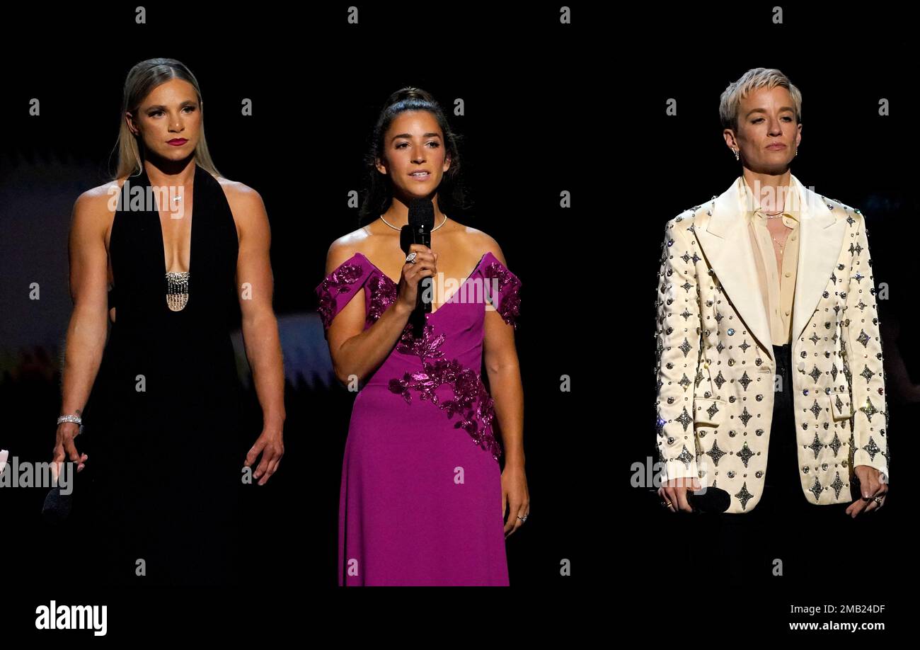 Oksana Masters, from left, Aly Raisman and Megan Rapinoe appear onstage ...