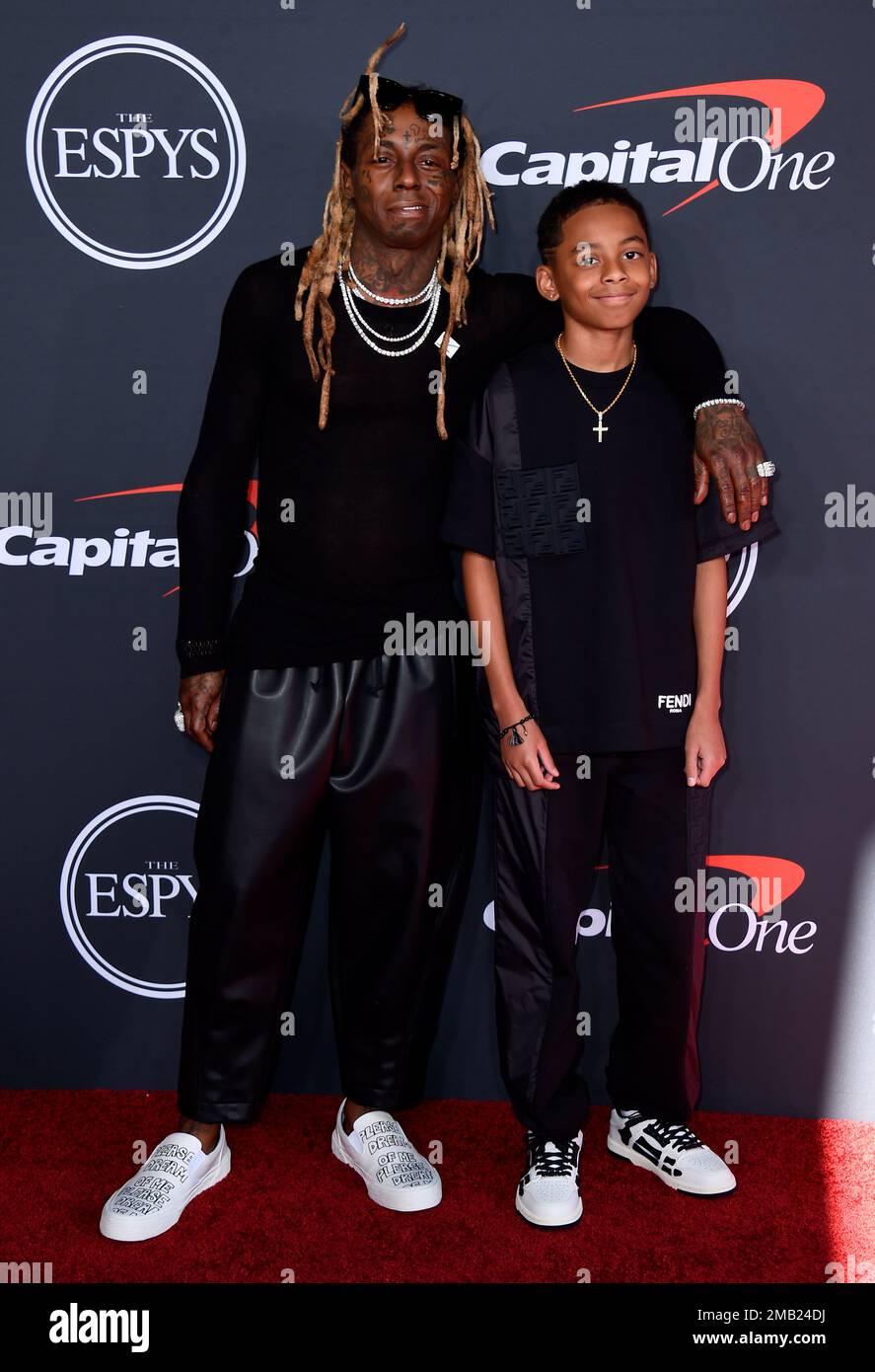 Lil Wayne, left, and Kameron Carter arrive at the ESPY Awards on ...