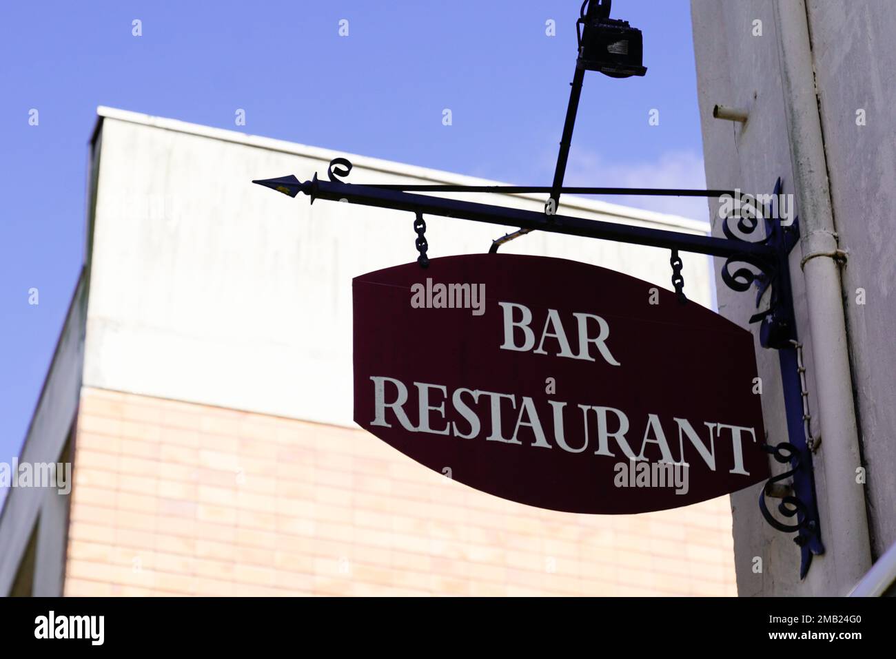 text bar restaurant vintage retro sign on facade wall front building ...
