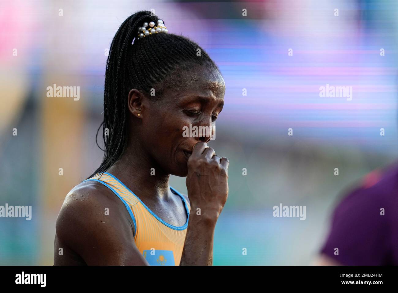 Norah Jeruto, of Kazakhstan, reacts after her win the women's 3000 ...