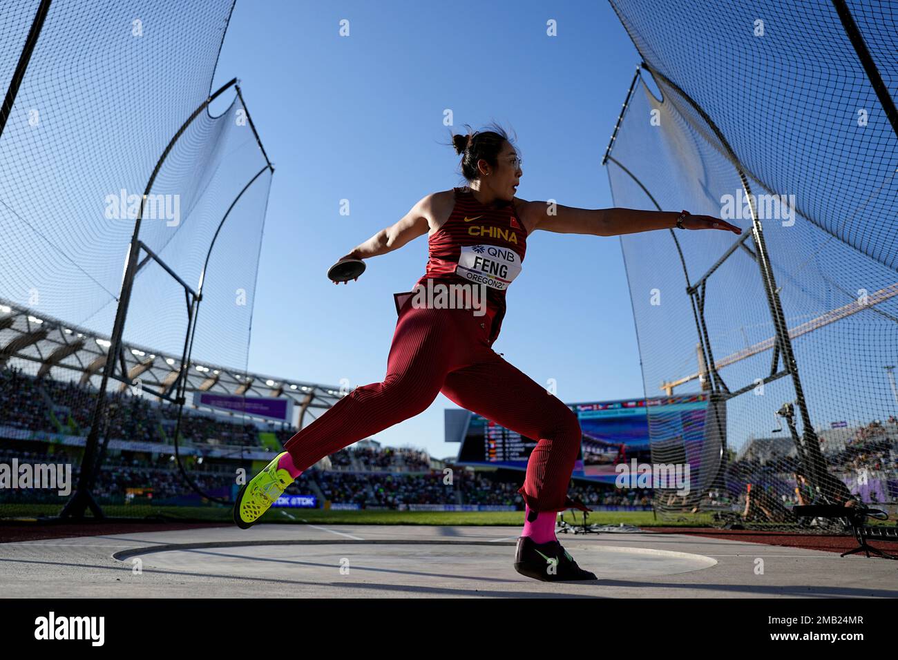 Bin Feng, of China, competes during the final of the women's discus ...