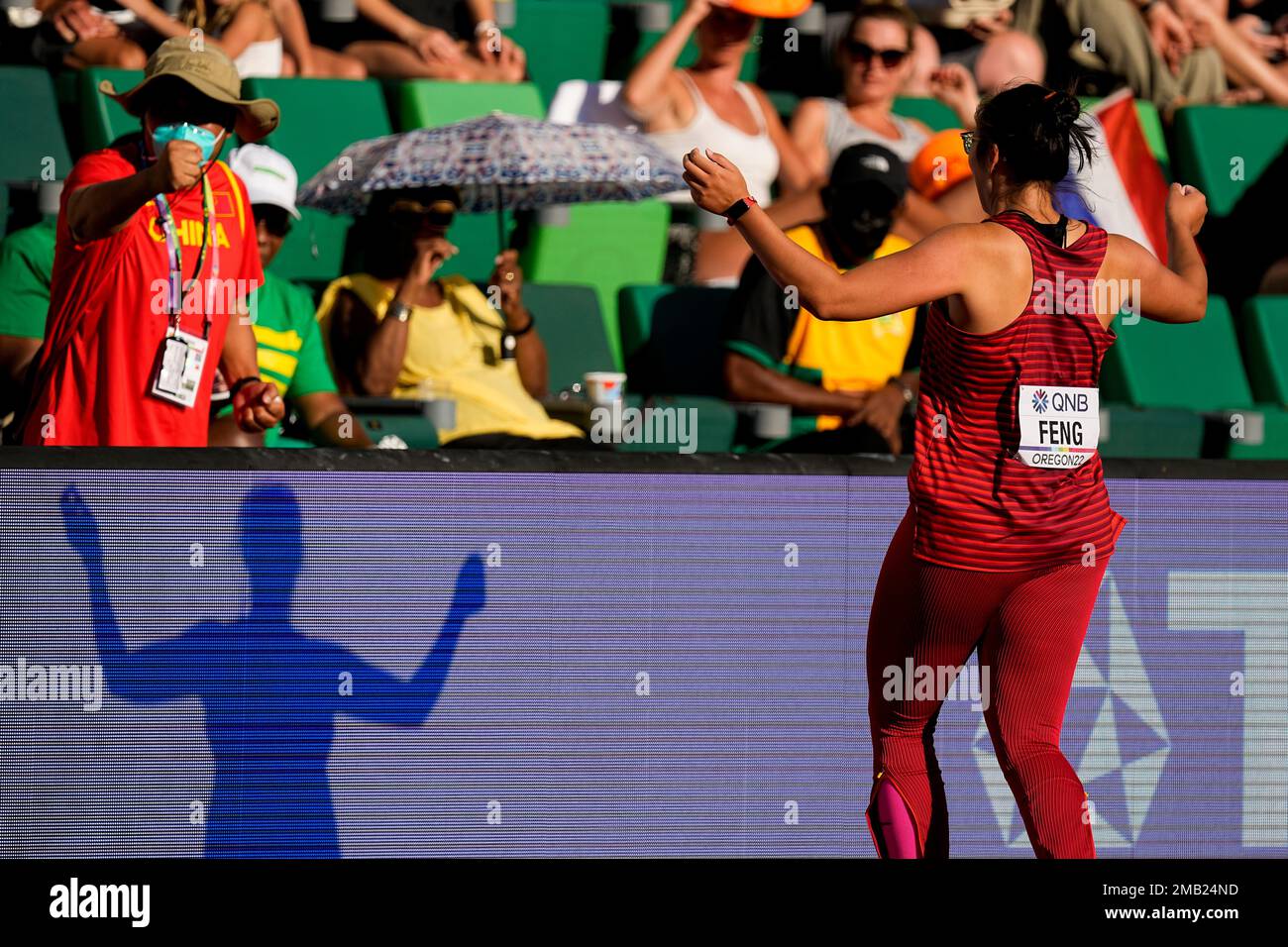 Bin Feng, of China, celebrates during the final of the women's discus ...