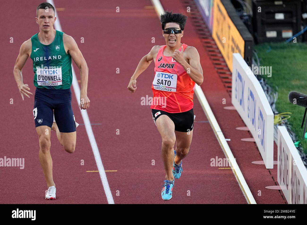 Fuga Sato, of Japan, competes in the semifinal of the women's 400-meter ...