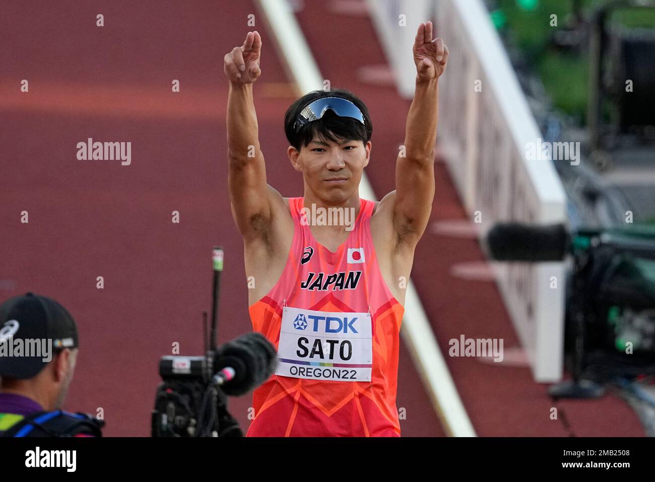 Fuga Sato, of Japan, competes in the semifinal of the women's 400-meter ...