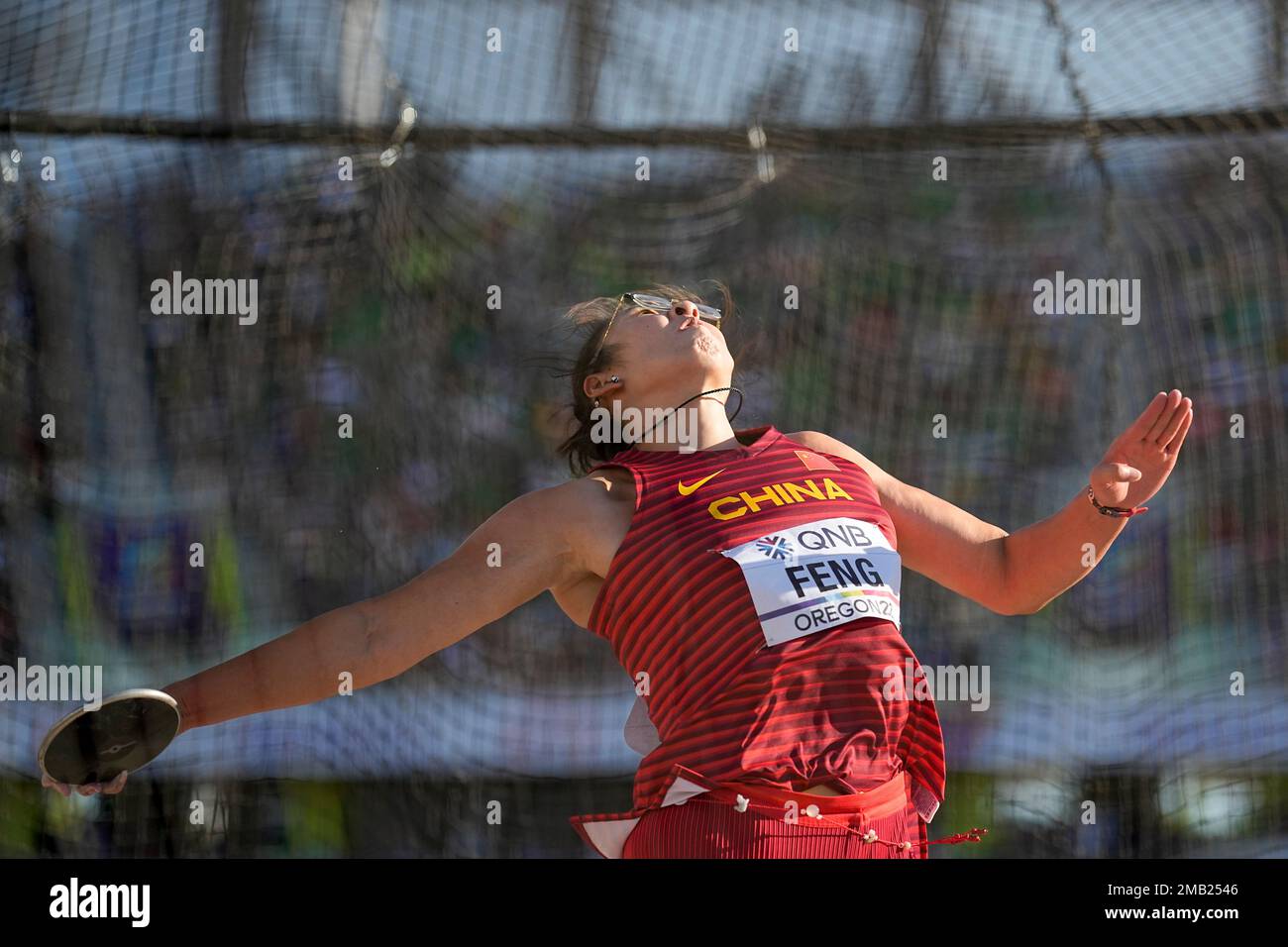 Bin Feng, of China, competes during the final of the women's discus ...