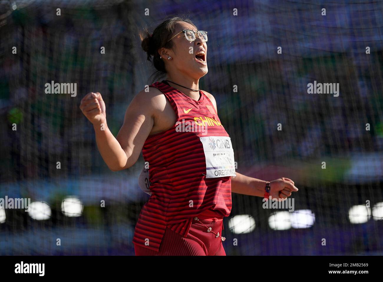 Bin Feng, of China, competes during the final of the women's discus ...