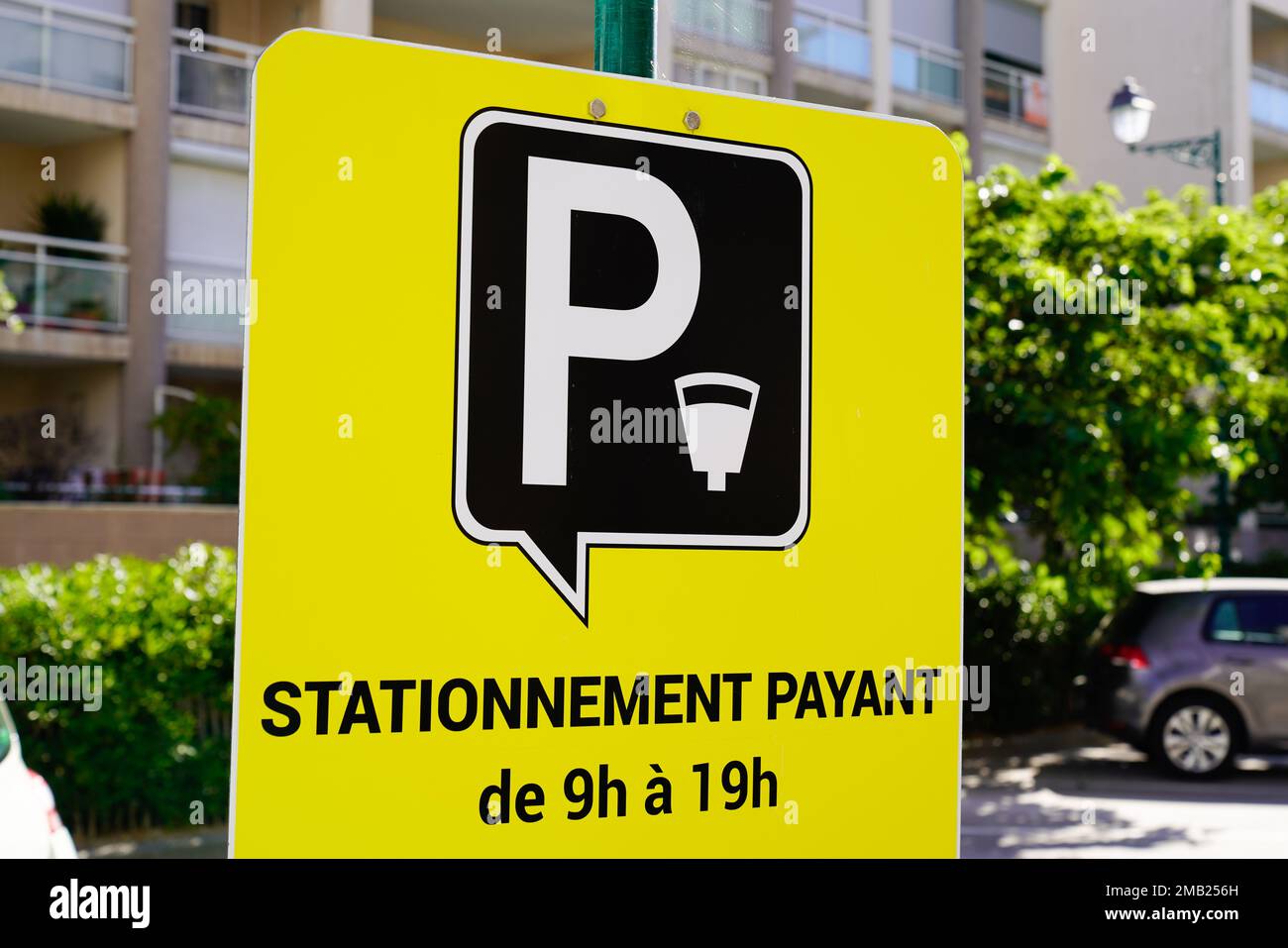 stationnement payant in france means paid parking french text yellow ...