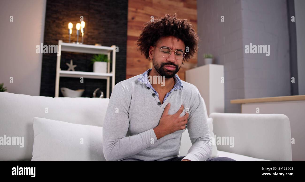 Man Chest Pain. Angina Or Heart Attack Stock Photo - Alamy