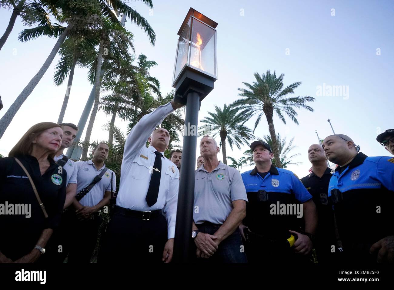 Ray Jadallah, center left, Miami-Dade Fire Rescue Deputy Fire Chief of ...