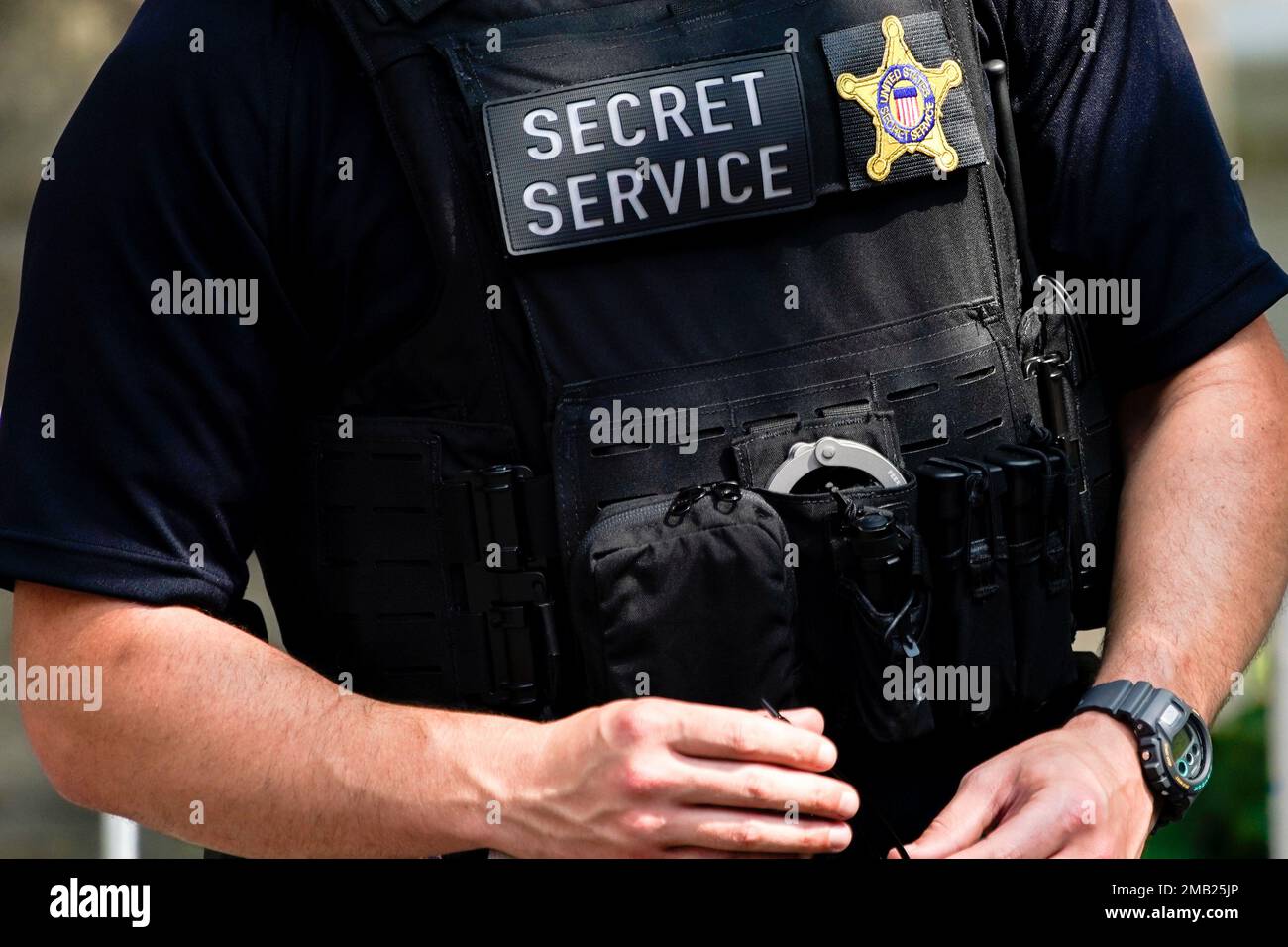 A secret service agent is stationed outside the funeral of Ivana Trump ...