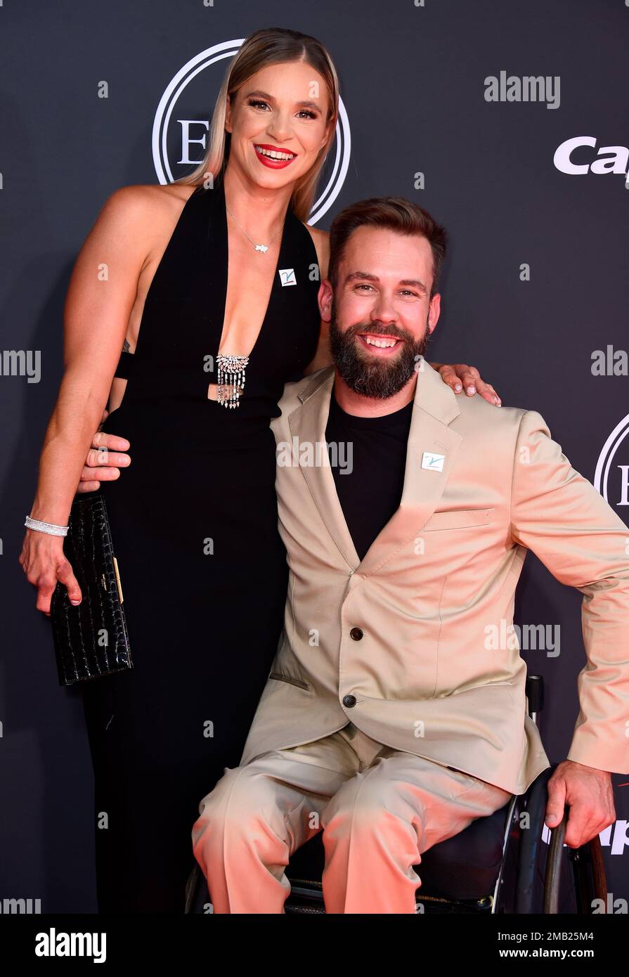 Cross country skier, road cyclist and biathlete Oksana Masters, left ...