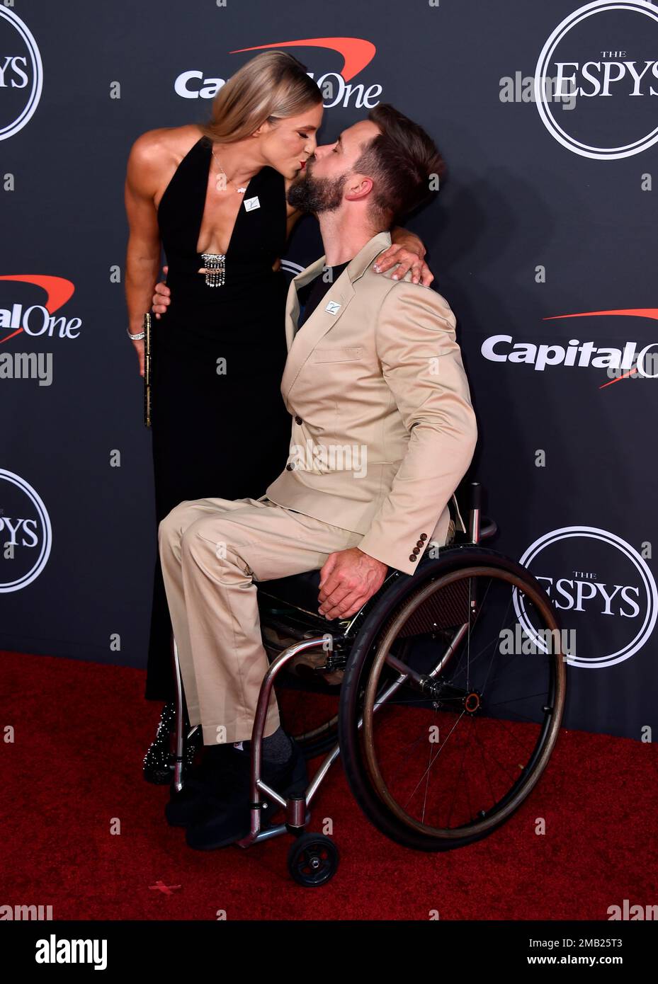 Cross country skier, road cyclist and biathlete Oksana Masters, left ...