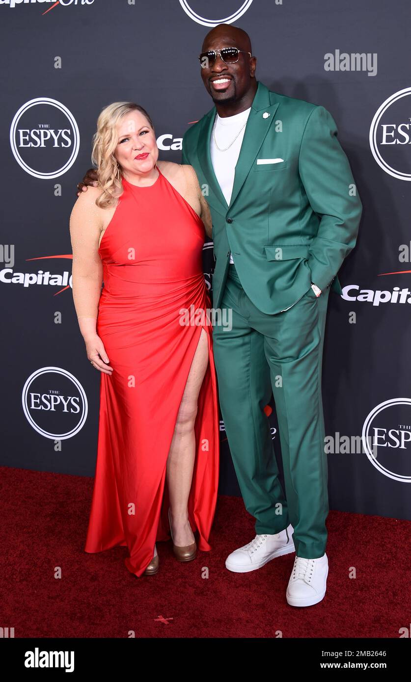 Holly Rowe, left, and WWE wrestler Titus O'Neil arrive at the ESPY ...