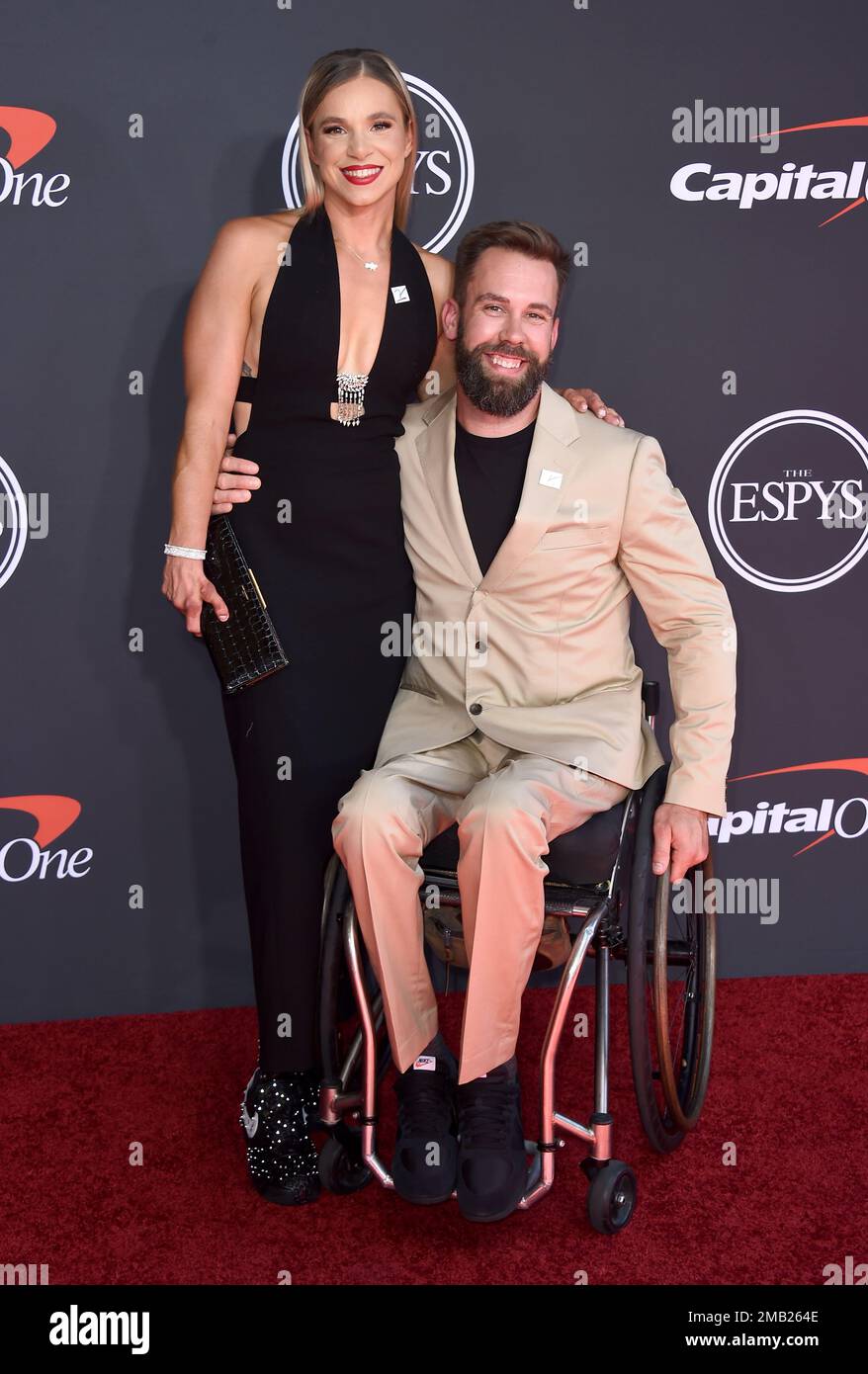 Cross country skier, road cyclist and biathlete Oksana Masters, left ...