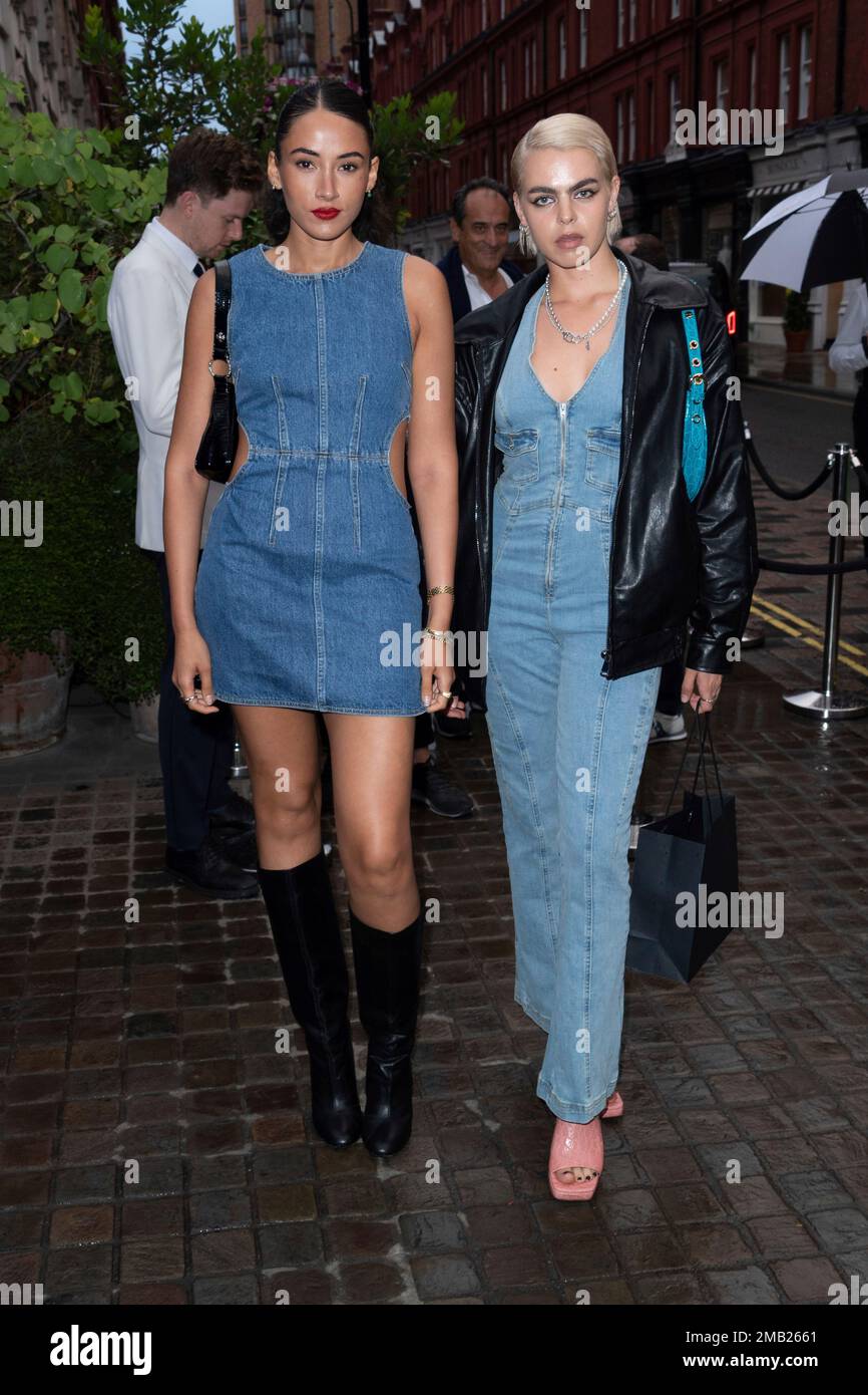 Cora Corre, left and Bee Beardsworth pose for photographers upon ...