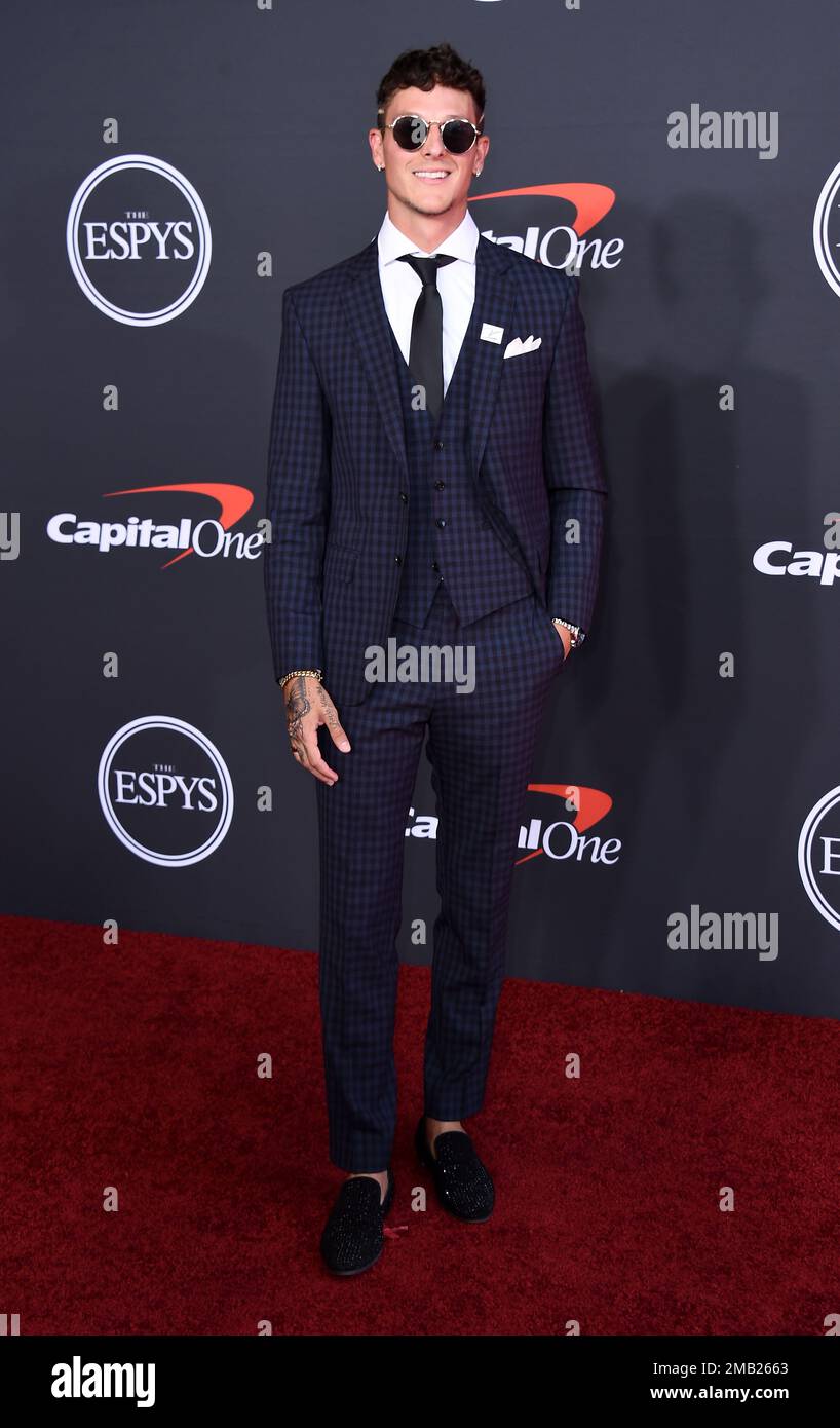 Track and field player Nick Mayhugh arrives at the ESPY Awards on ...