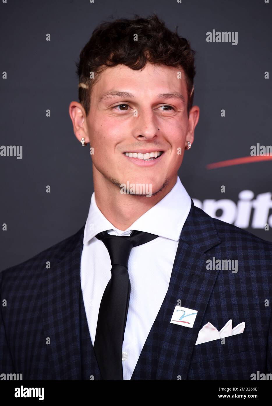 Track and field player Nick Mayhugh arrives at the ESPY Awards on ...
