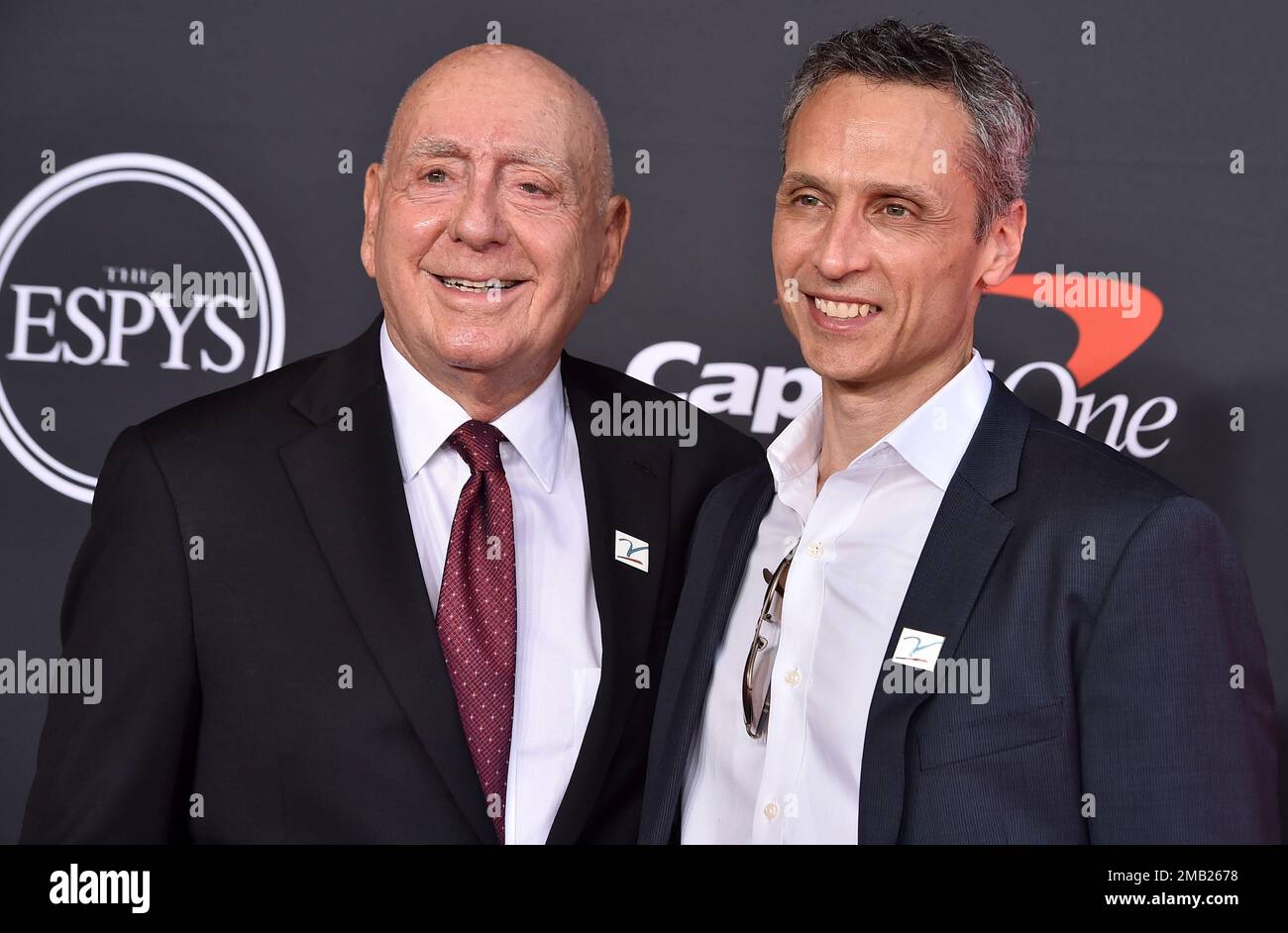 Dick Vitale, left, and President of ESPN Inc. James Pitaro arrive at ...