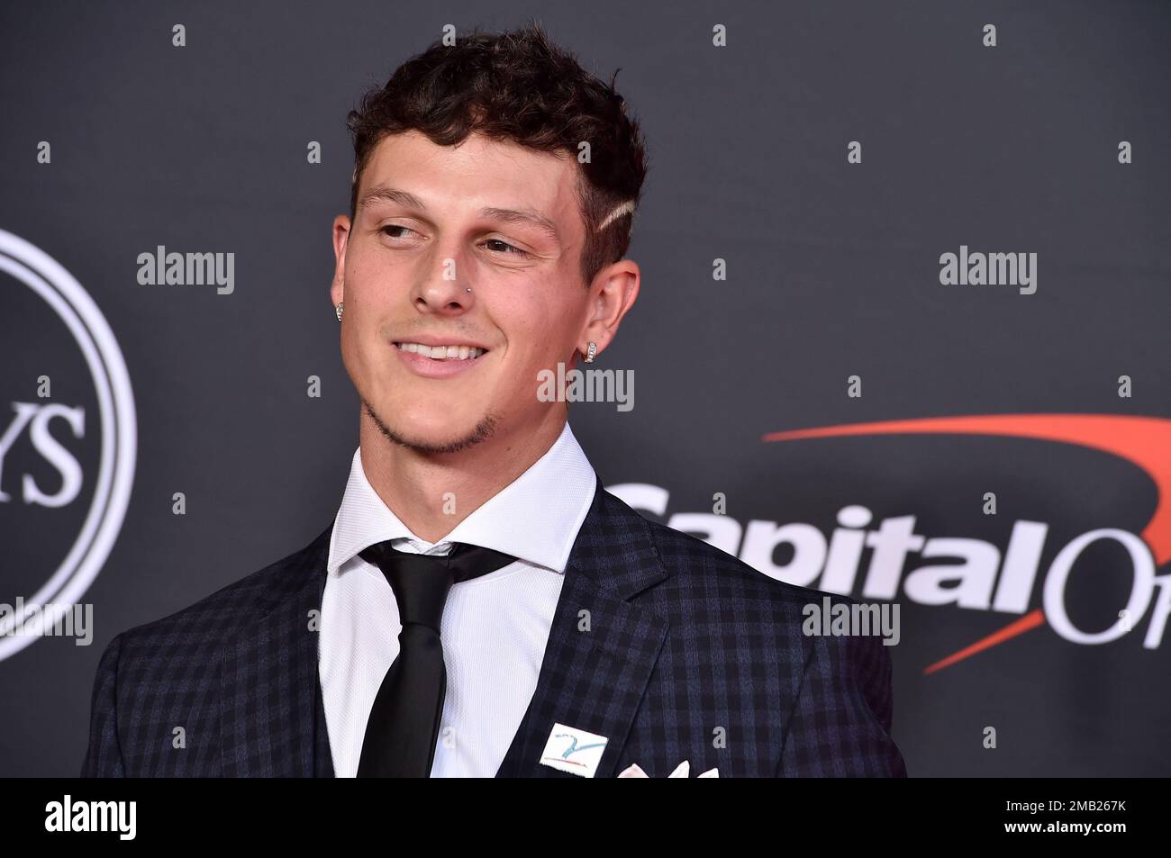Track and field player Nick Mayhugh arrives at the ESPY Awards on ...