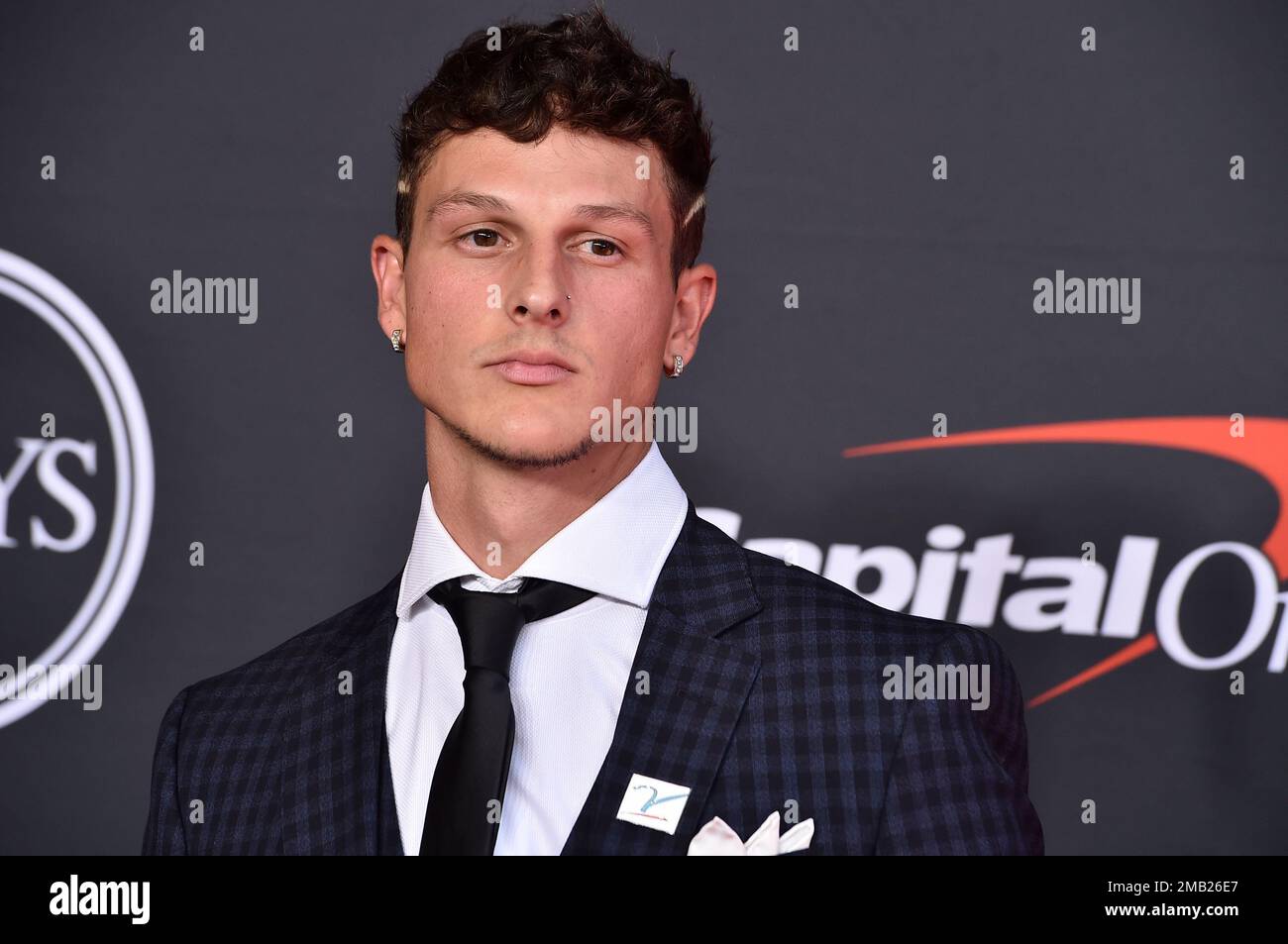 Track and field player Nick Mayhugh arrives at the ESPY Awards on ...