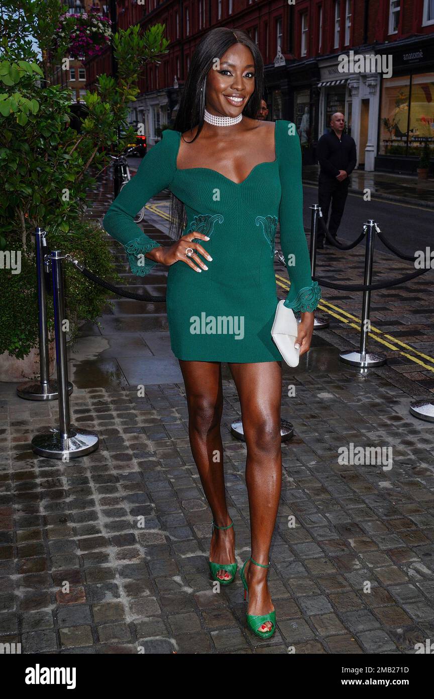 AJ Odudu poses for photographers upon arrival the Vogue x Self-Portrait ...