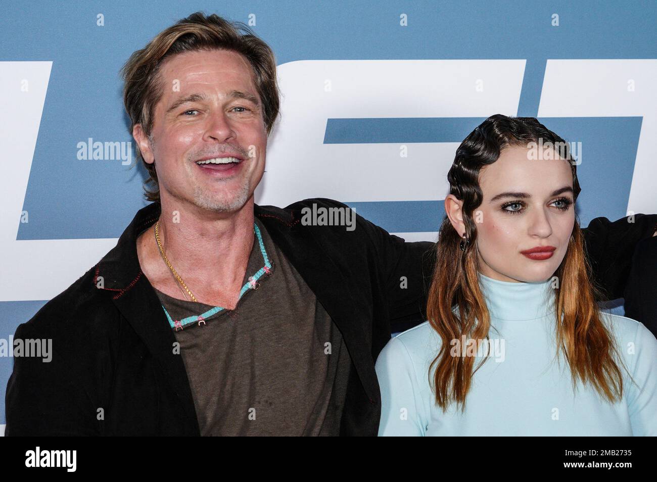 Brad Pitt left, and Joey King pose for photographers upon arrival at ...