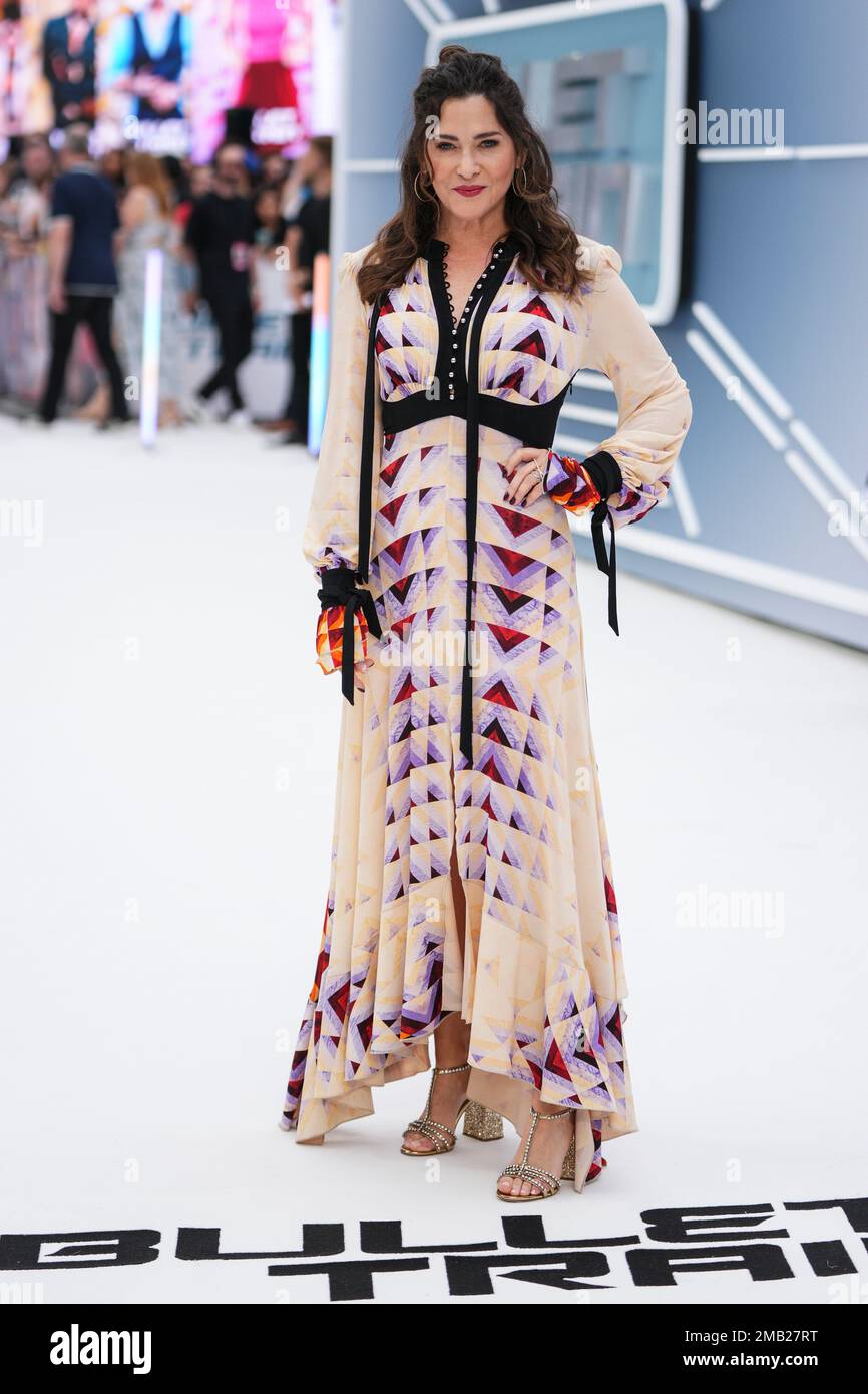 Producer Kelly McCormick poses for photographers upon arrival for the ...