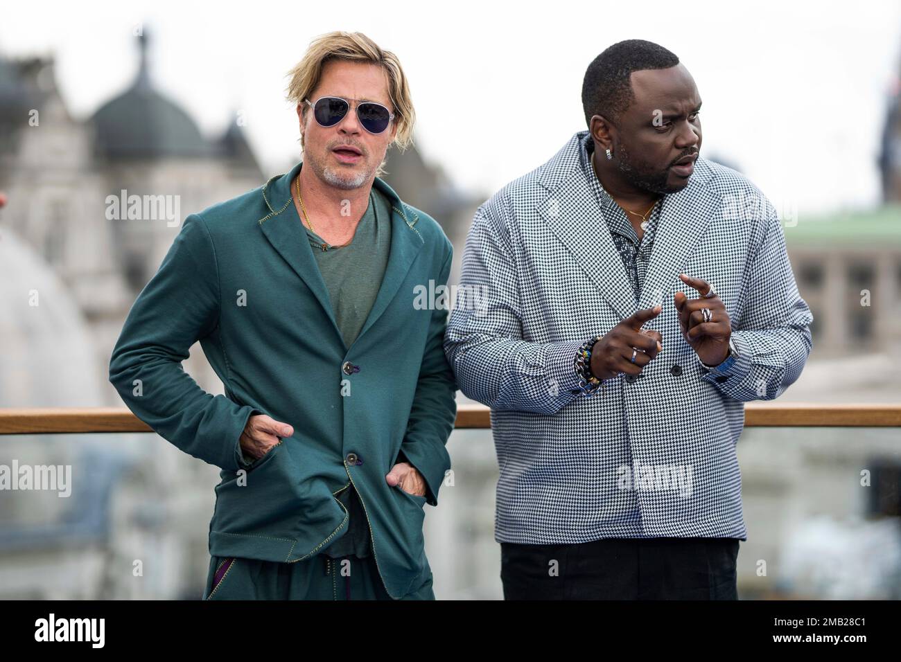 Brad Pitt, left, and Brian Tyree Henry pose for photographers during a ...
