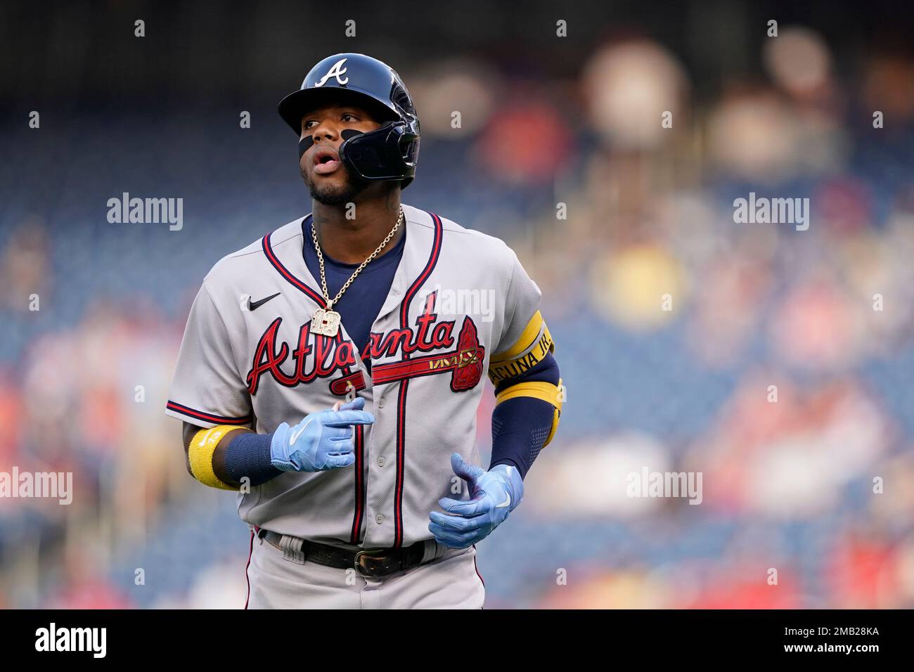 Atlanta Braves' Ronald Acuna Jr. runs off the field after an at-bat in ...