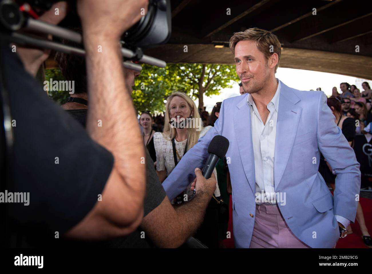 Ryan Gosling is interviewed upon arrival at the screening of the film ...