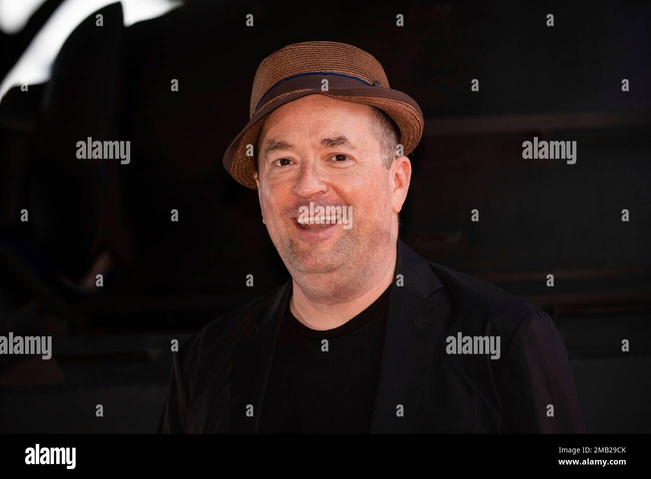 Christopher Markus poses for photographers upon arrival at the screening of the film 'The Gray ...