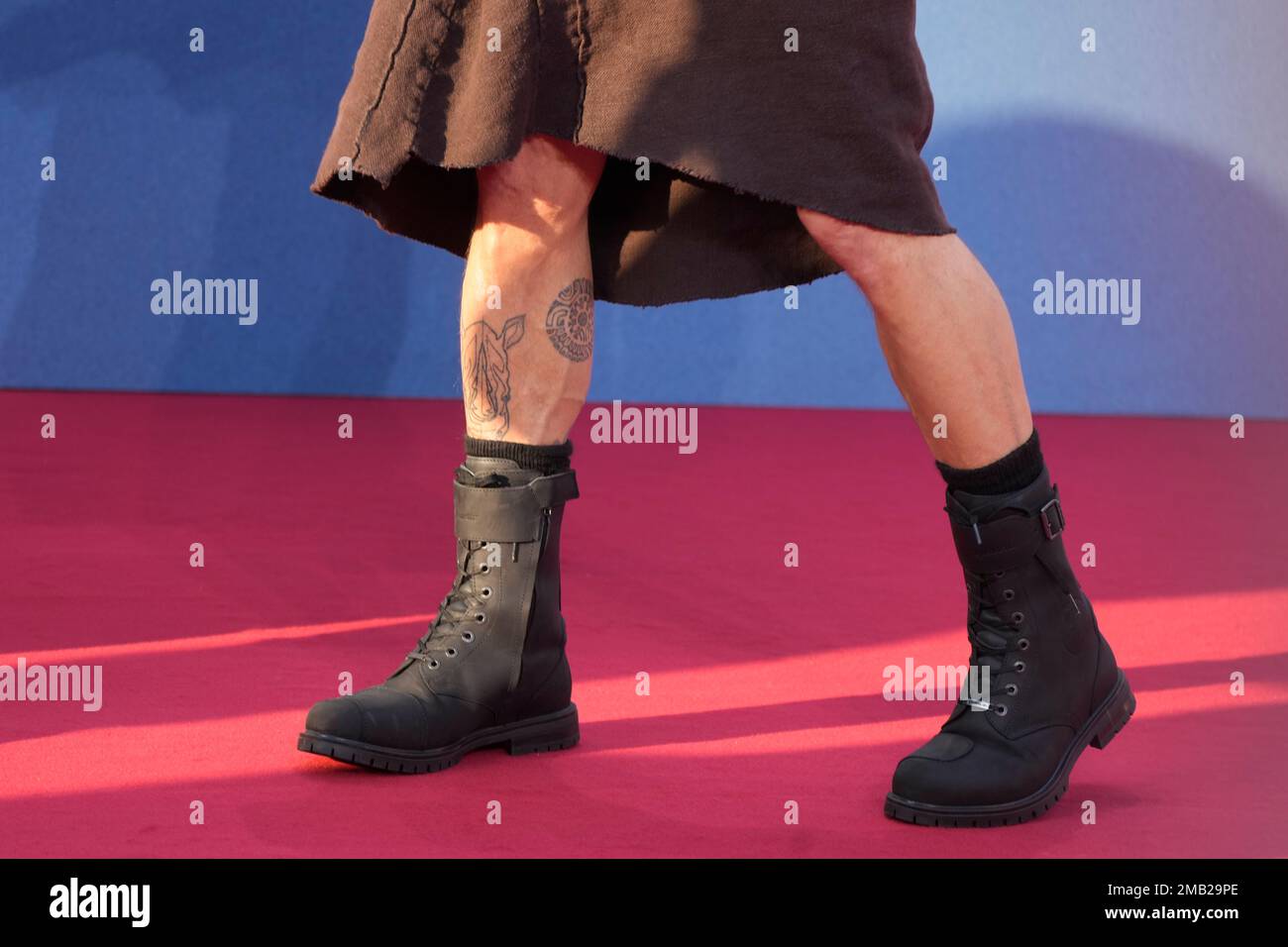 Brad Pitt, center, arrives for the premiere of the film 'Bullet Train ...