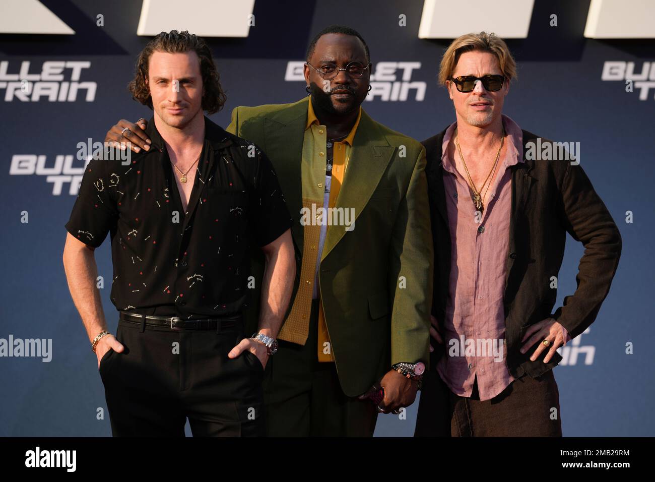From left actors Aaron Taylor-Johnson, Brian Tyree Henry and Brad Pitt ...