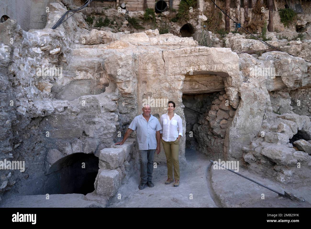 Hebrew University archaeologists Dr. Oren Gutfeld, left, and Michal ...