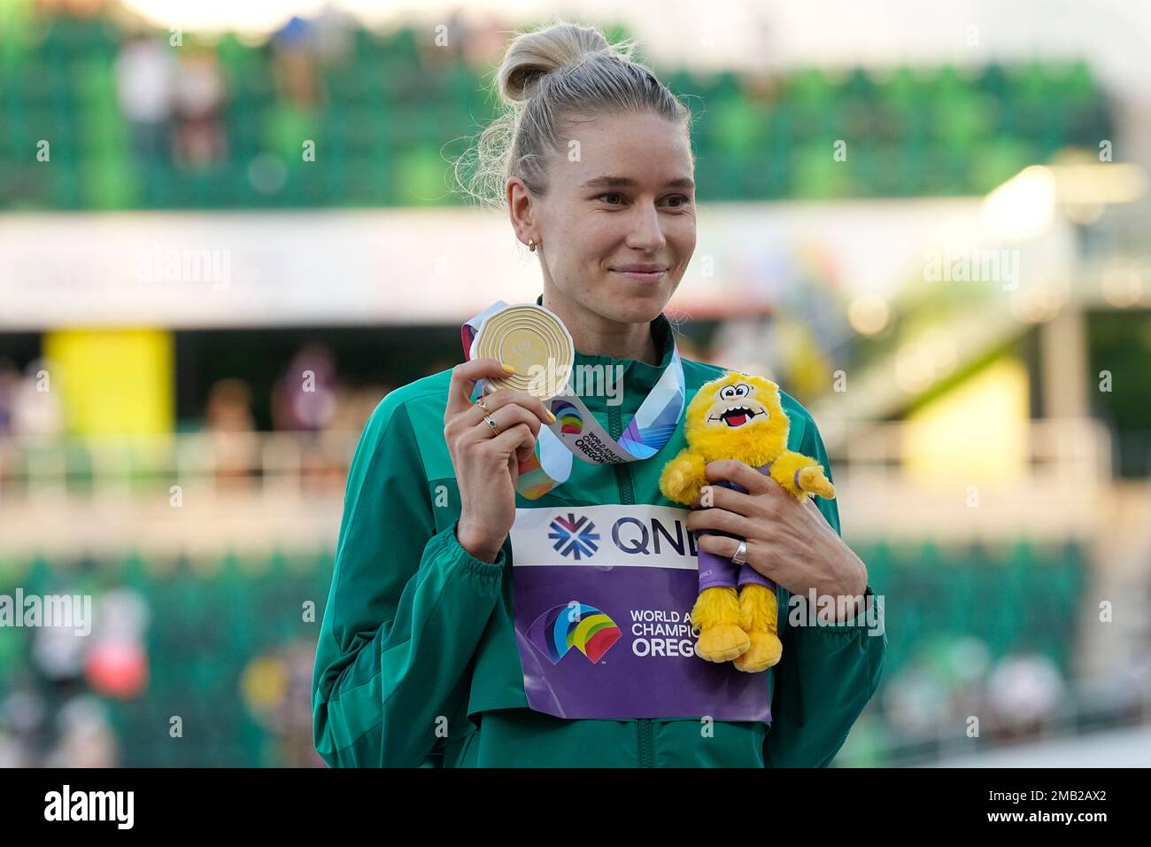 Gold medalist Eleanor Patterson, of Australia, poses on the podium ...