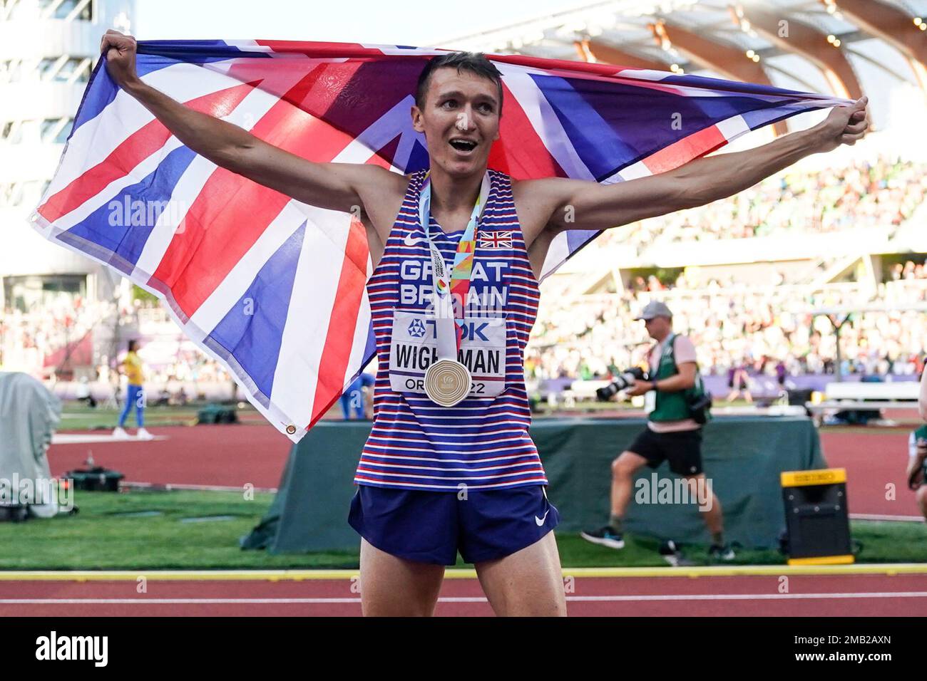 Gold medalist Jake Wightman, of Britain, celebrates winning the men's ...