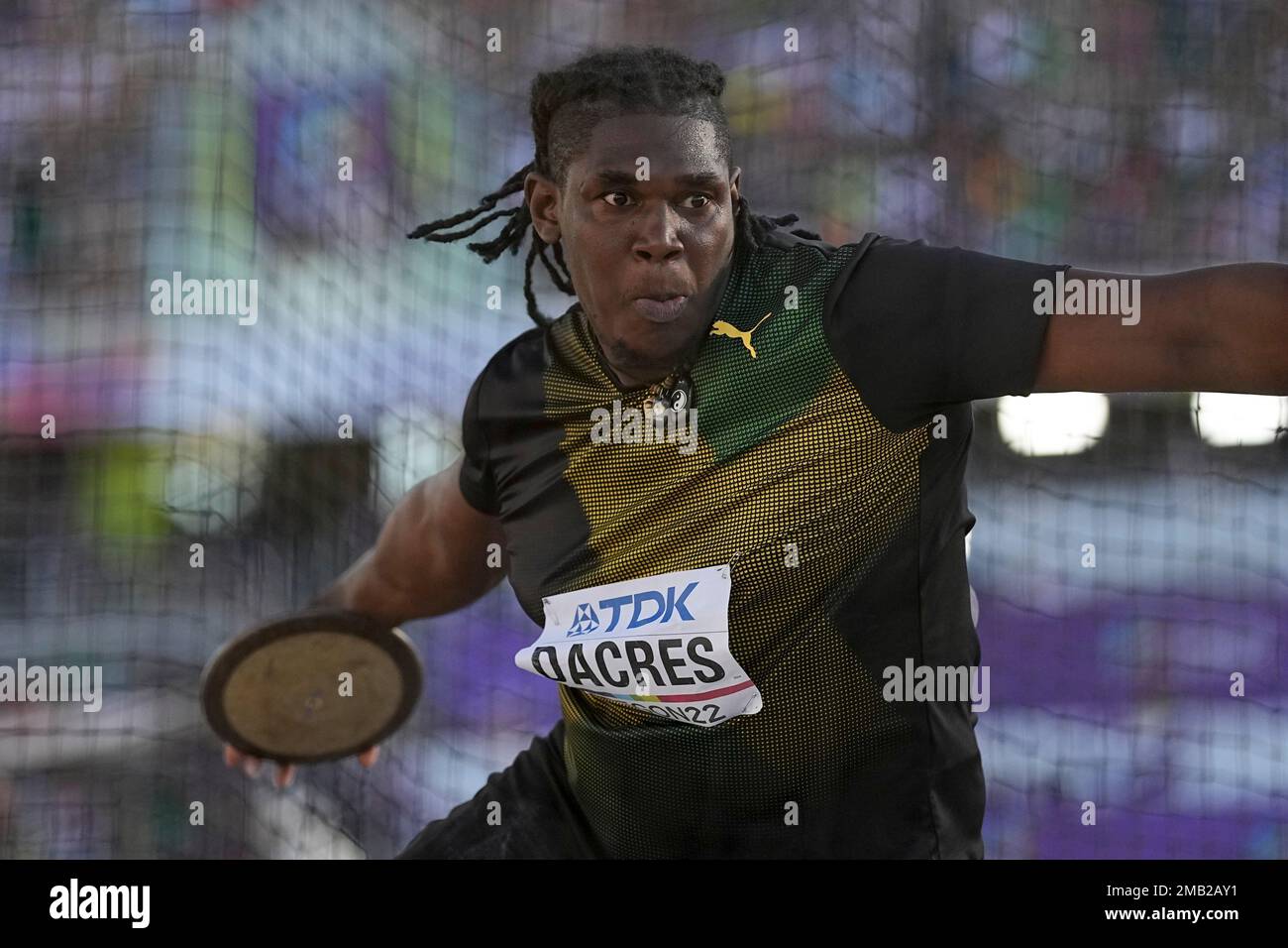 Fedrick Dacres, of Jamaica, competes during the final of the men's ...