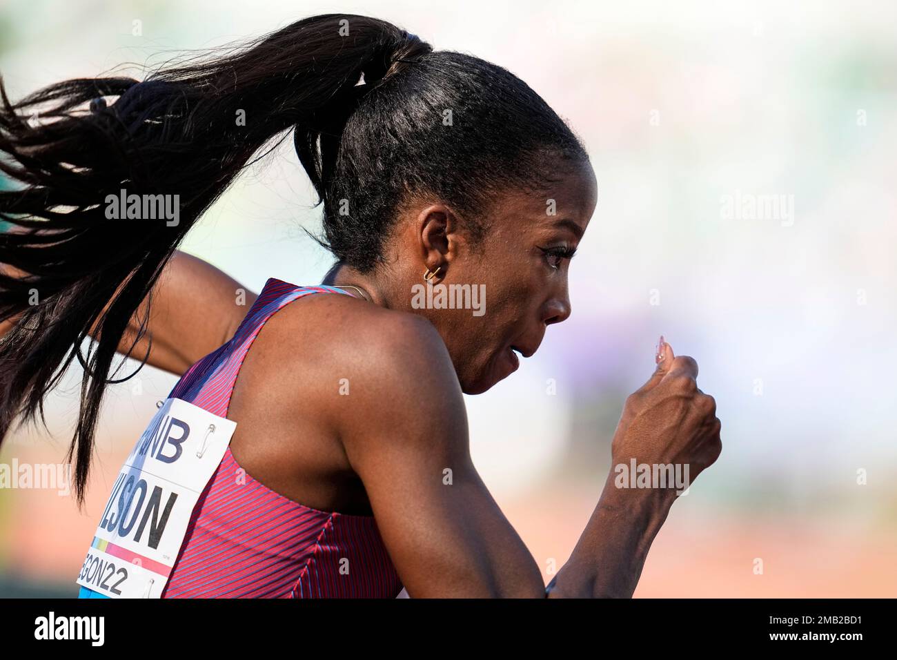 Britton Wilson, of the United States, wins in a heat during the women's ...
