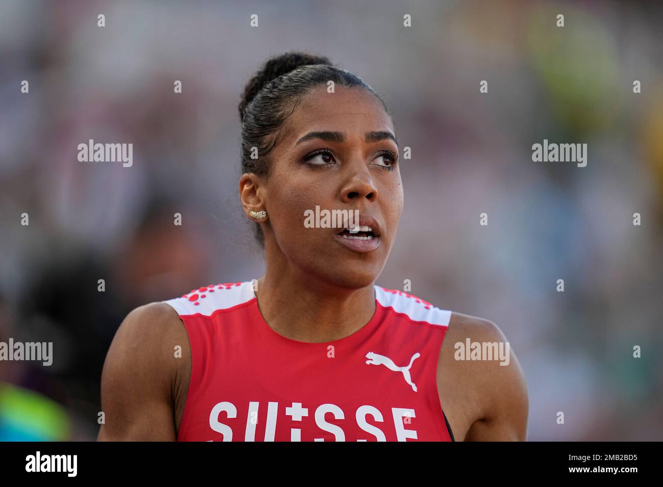 Mujinga Kambundji, of Switzerland, competes in a heat during the women ...