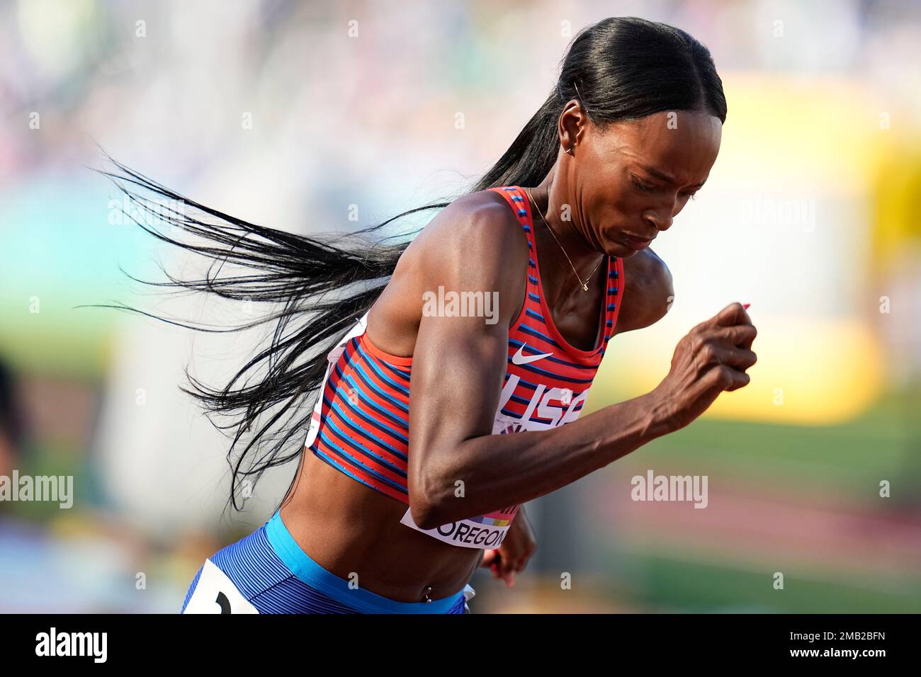 Dalilah Muhammad, of the United States, wins in a heat during the women ...