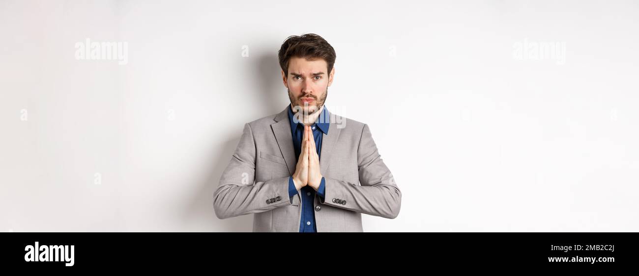 Sad cute business man need help, say please or sorry, showing begging ...
