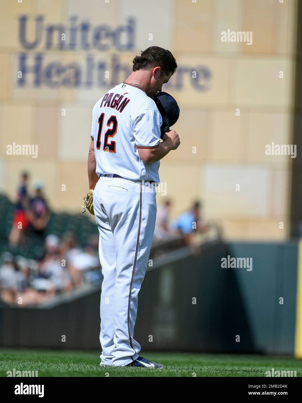 Minnesota Twins pitcher Emilio Pagan takes a moment before throwing ...