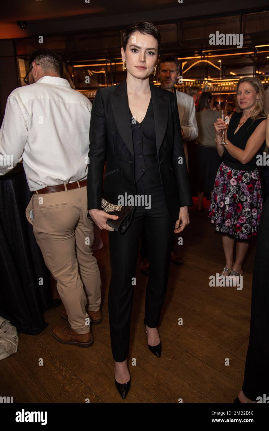 Daisy Ridley poses for photographers before the screening of the film ...