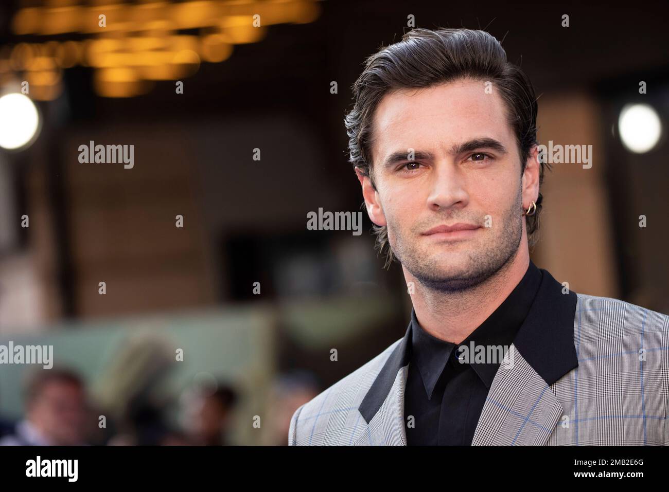 Tom Bateman poses for photographers upon arrival for the screening of ...