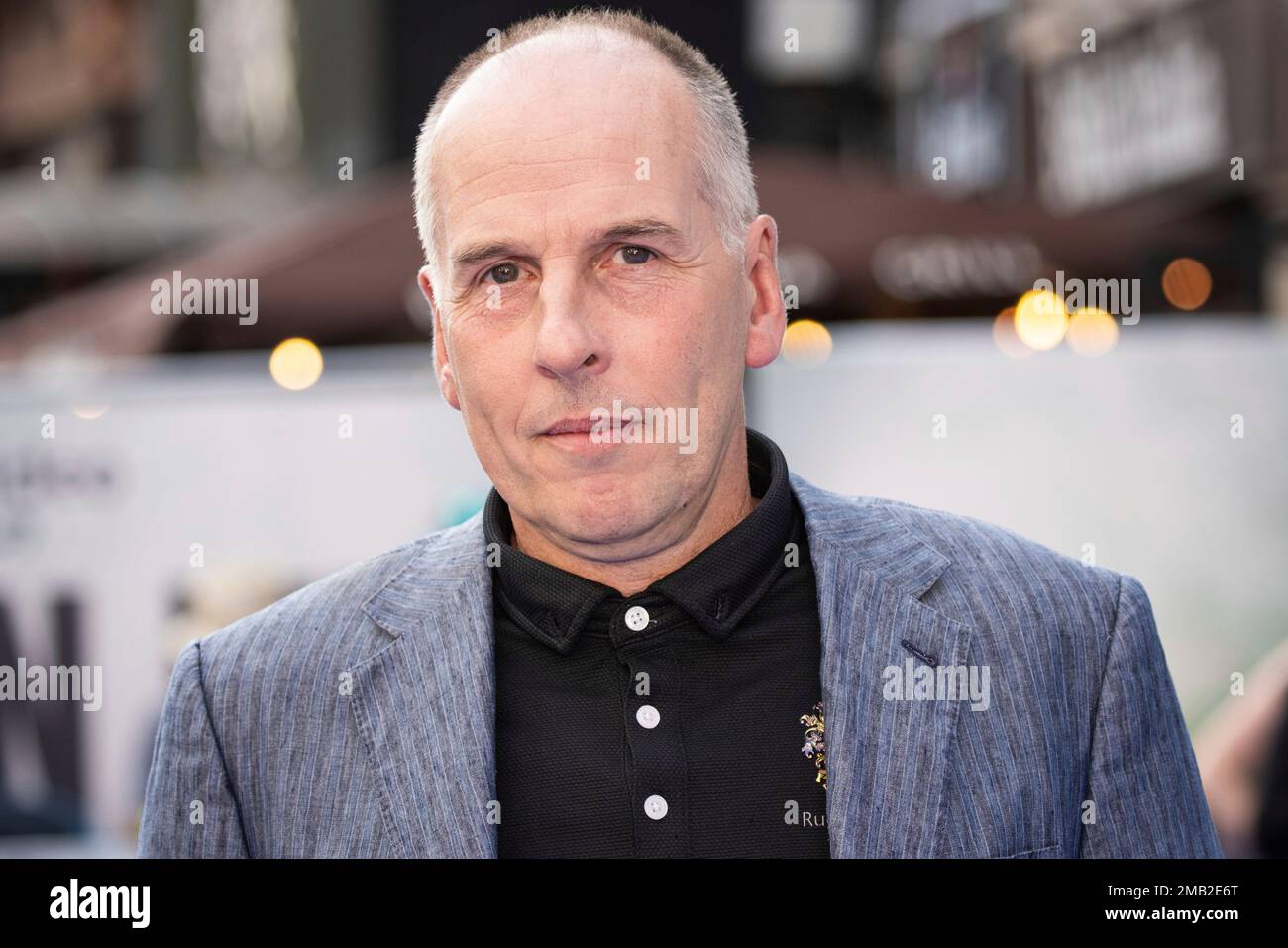 Diver Rick Stanton poses for photographers upon arrival for the ...