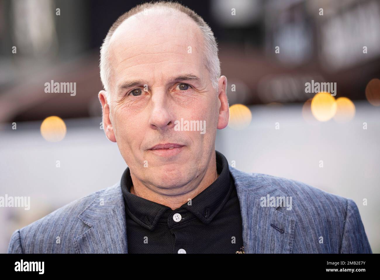 Diver Rick Stanton poses for photographers upon arrival for the ...