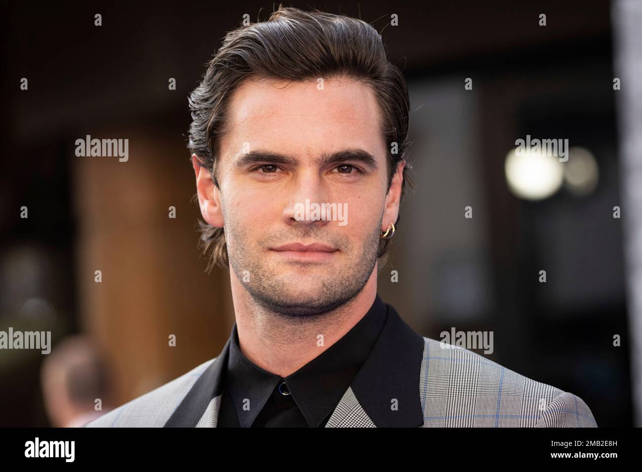 Tom Bateman poses for photographers upon arrival for the screening of ...